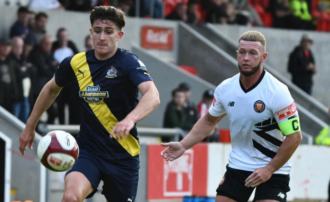 Tough going for young Alty side as FC United turn on the style ...